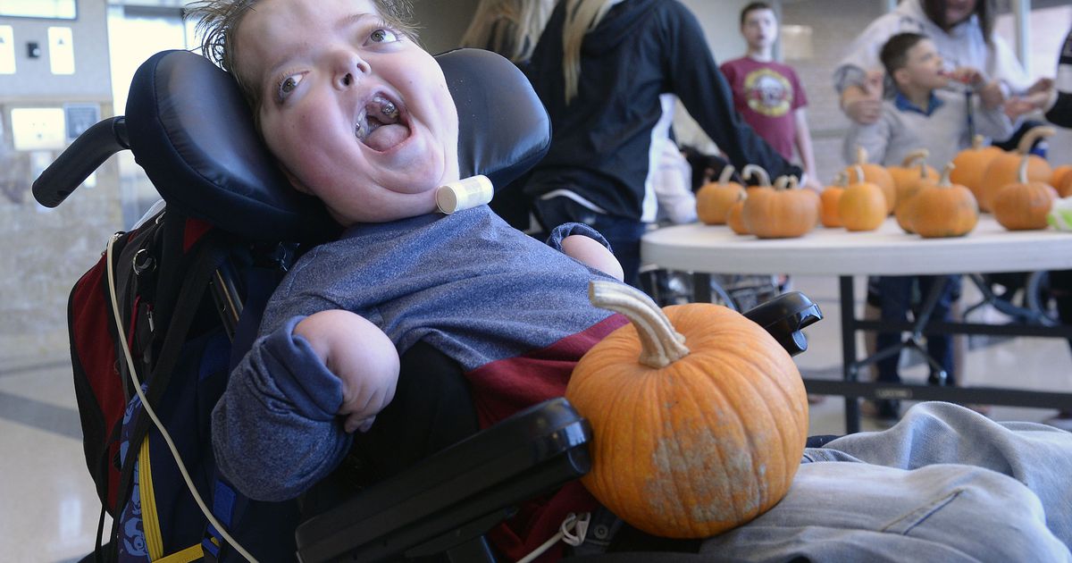 Utah special needs students pick out pumpkins grown by prison inmates