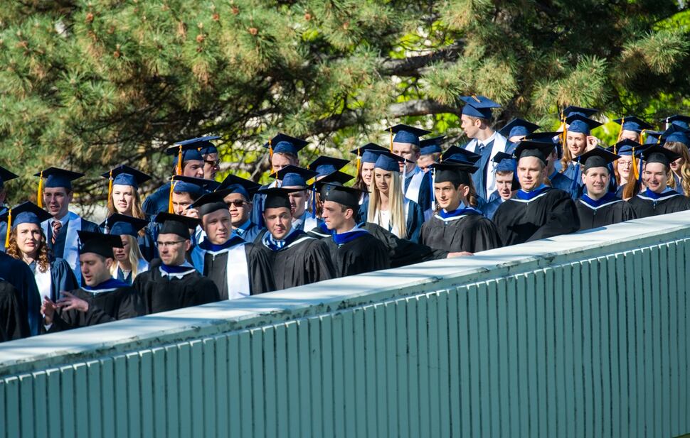 BYU graduates its biggest class ever with blue gowns, smiles and jokes ...