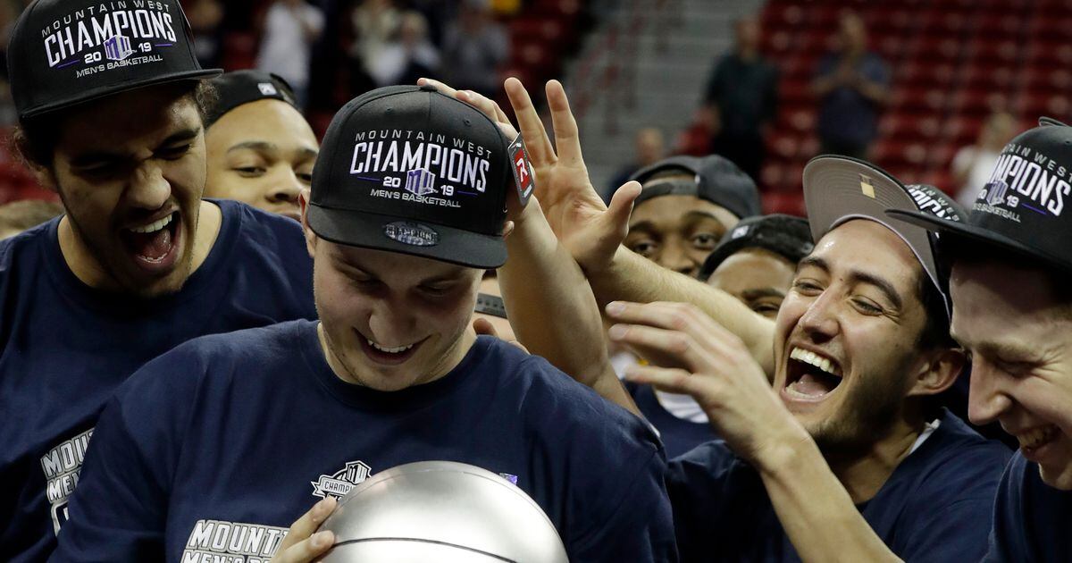 Sam Merrill leads Utah State to MW tournament title, after witnessing ...