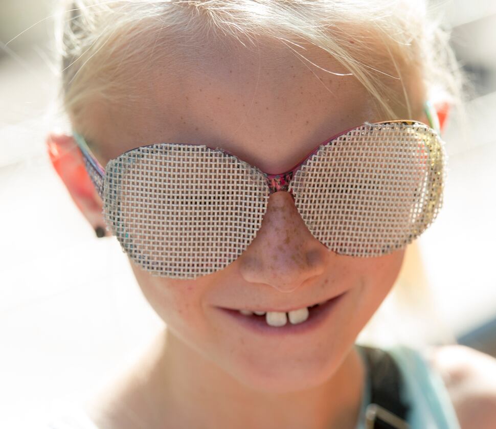 Princess the rhino officially debuts her one-of-a-kind pink fly mask ...