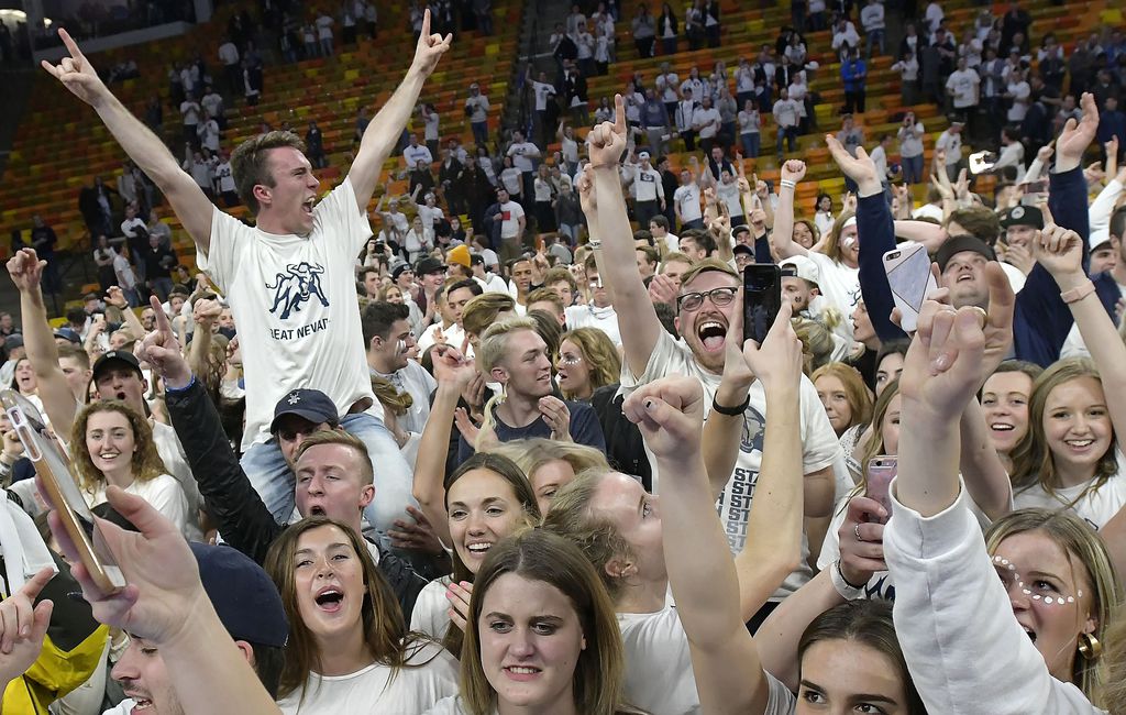 Ncaa Basketball Fans Storming The Court