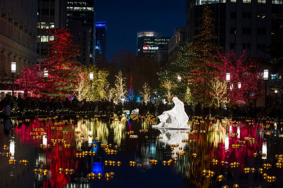 Christmas lights switch on at Temple Square, while a new holiday ...