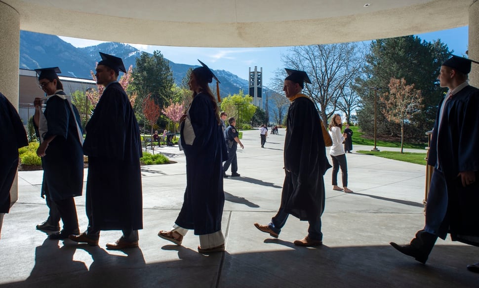 BYU graduates its biggest class ever with blue gowns, smiles and jokes ...